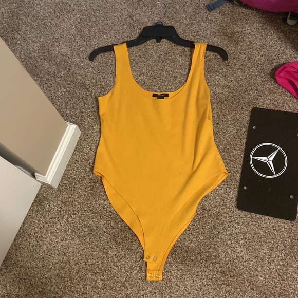 Forever 21 | Tops | Yellow Seamless Silky Bodysuit | Poshmark
